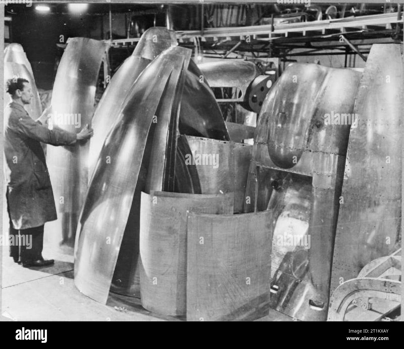 Birth of a Bomber- Aircraft Production in Britain, 1942 A worker ...