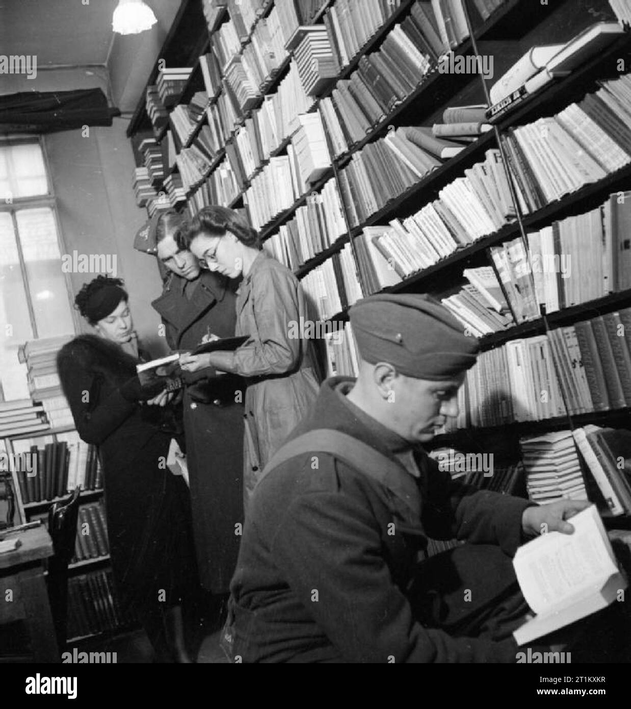 Leafing through book Black and White Stock Photos & Images - Alamy