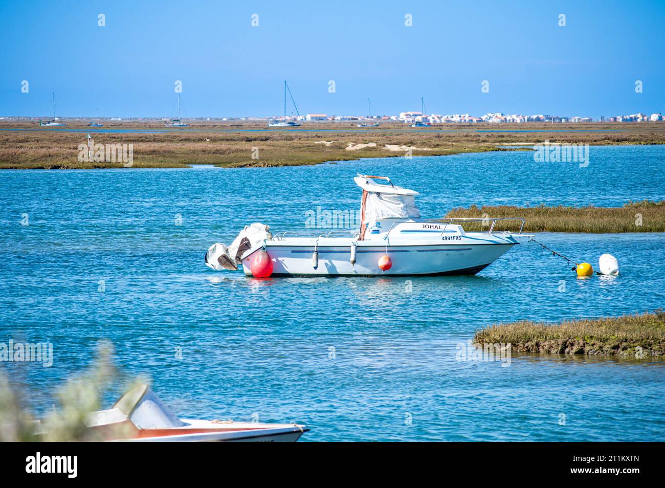 FARO, PORTUGAL - MARCH 1, 2023: Boats in lagoons in Faro, Portugal on ...