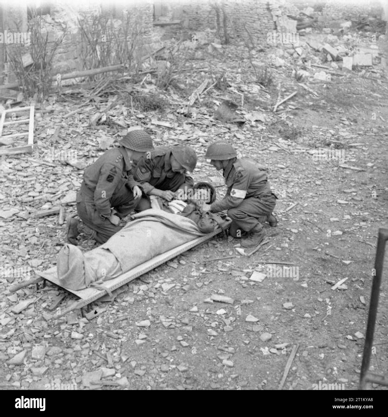 The British Army in Normandy 1944 A casualty on a stretcher being ...