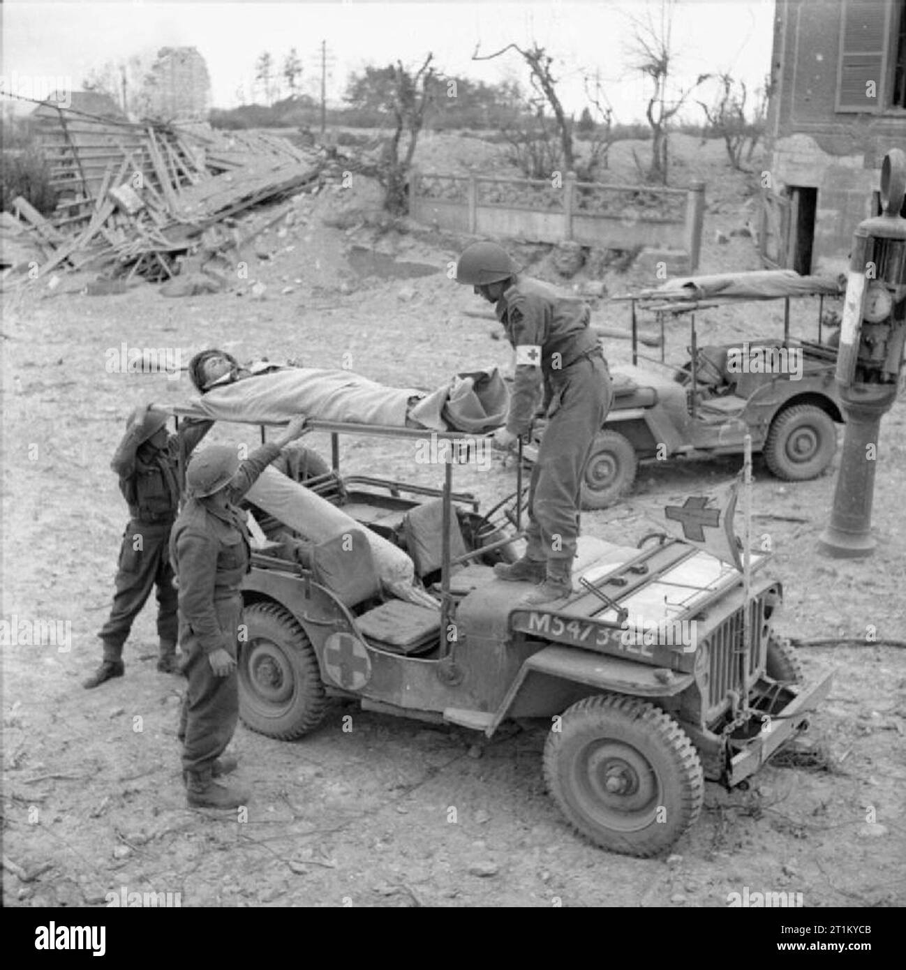 The British Army in Normandy 1944 A casualty on a stretcher being ...