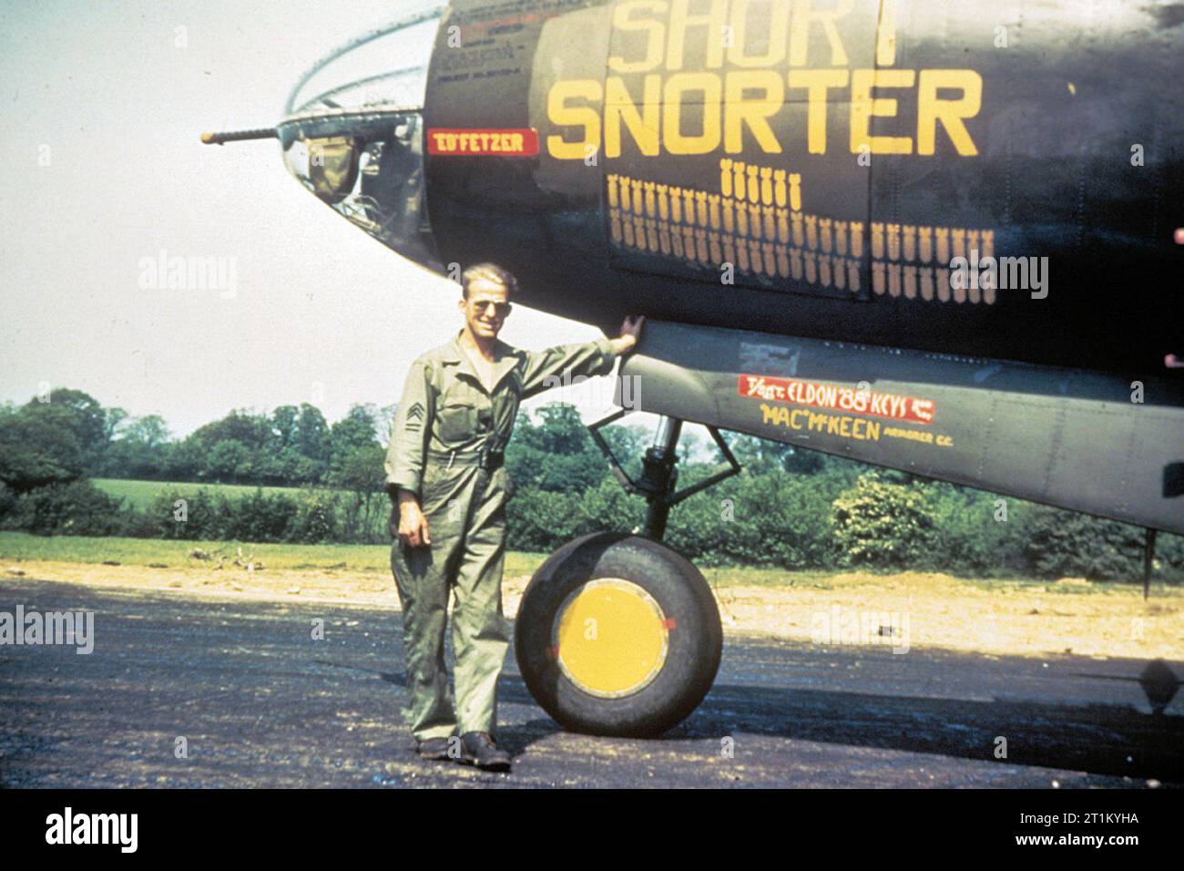 A ground crewman of the 387th Bomb Group with a B-26 Marauder (FW-T ...