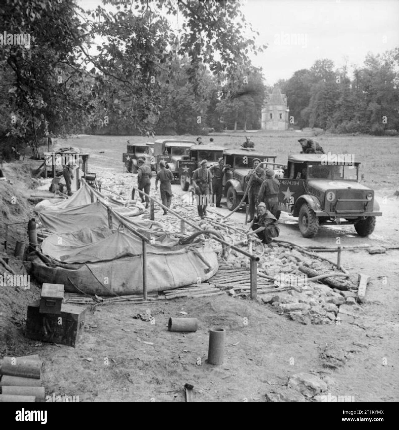 The British Army in Normandy 1944 Water-carrying trucks of 12 Corps ...