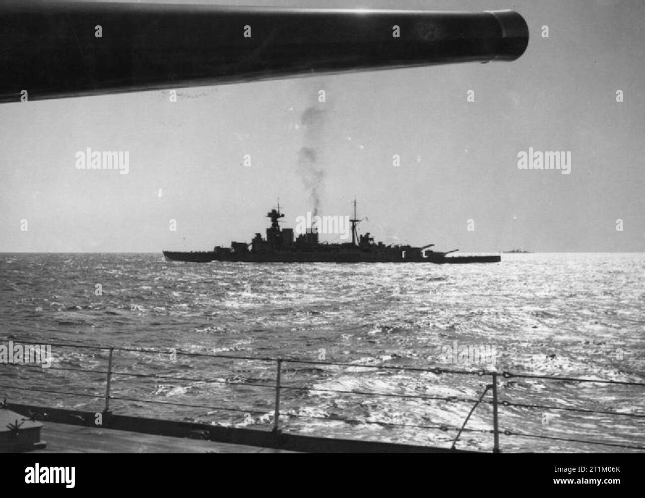HMS Hood HMS HOOD in the middle distance, silhouetted under a 15 inch ...