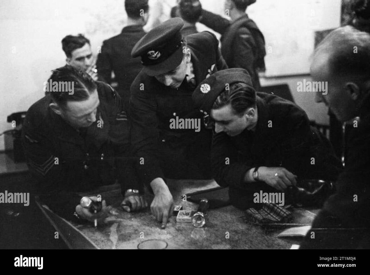 RAF Bomber Command 1940 Wellington crews use maps to compare what they ...