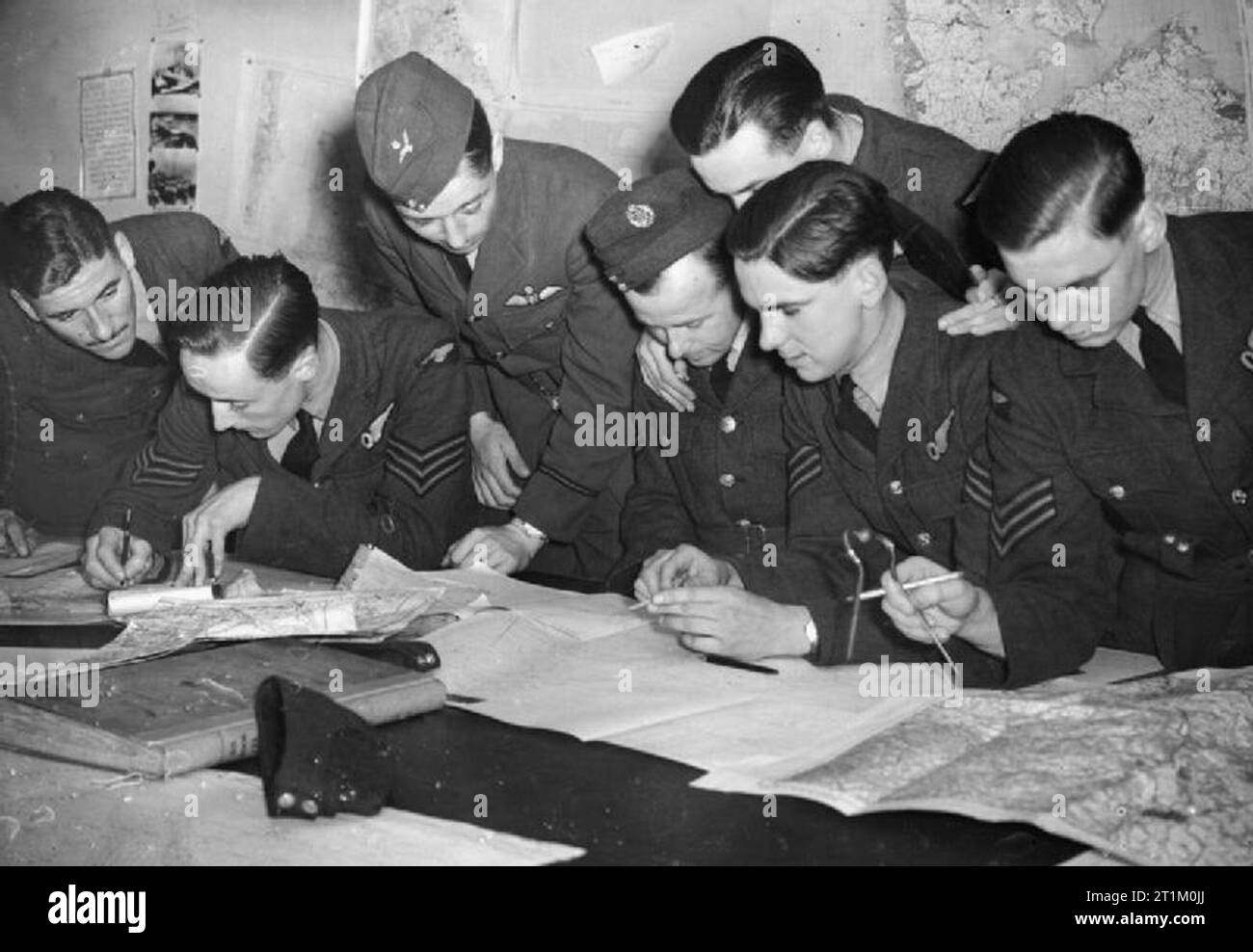 RAF Bomber Command 1940 Wellington observers receive final instructions ...