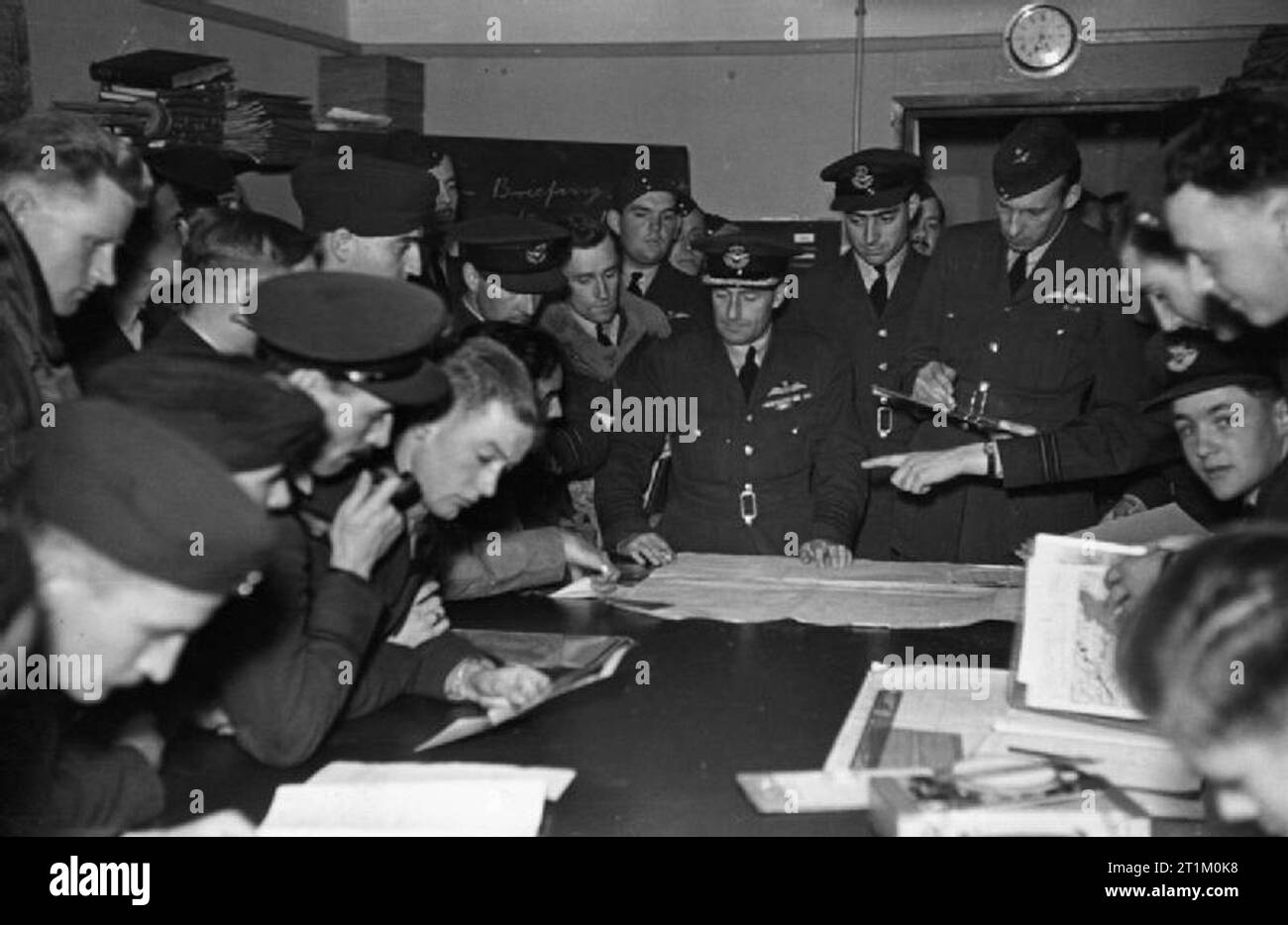 RAF Bomber Command 1940 Wellington crews studying maps at a briefing ...