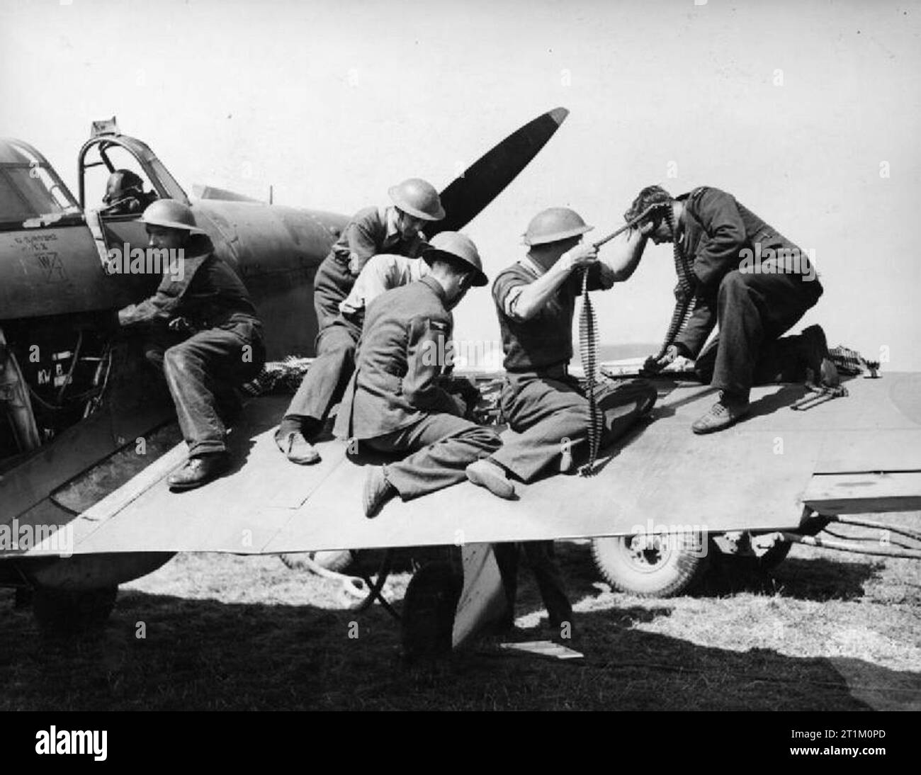 RAF Fighter Command 1940 Ground staff re-arm a Hawker Hurricane Mk I of ...