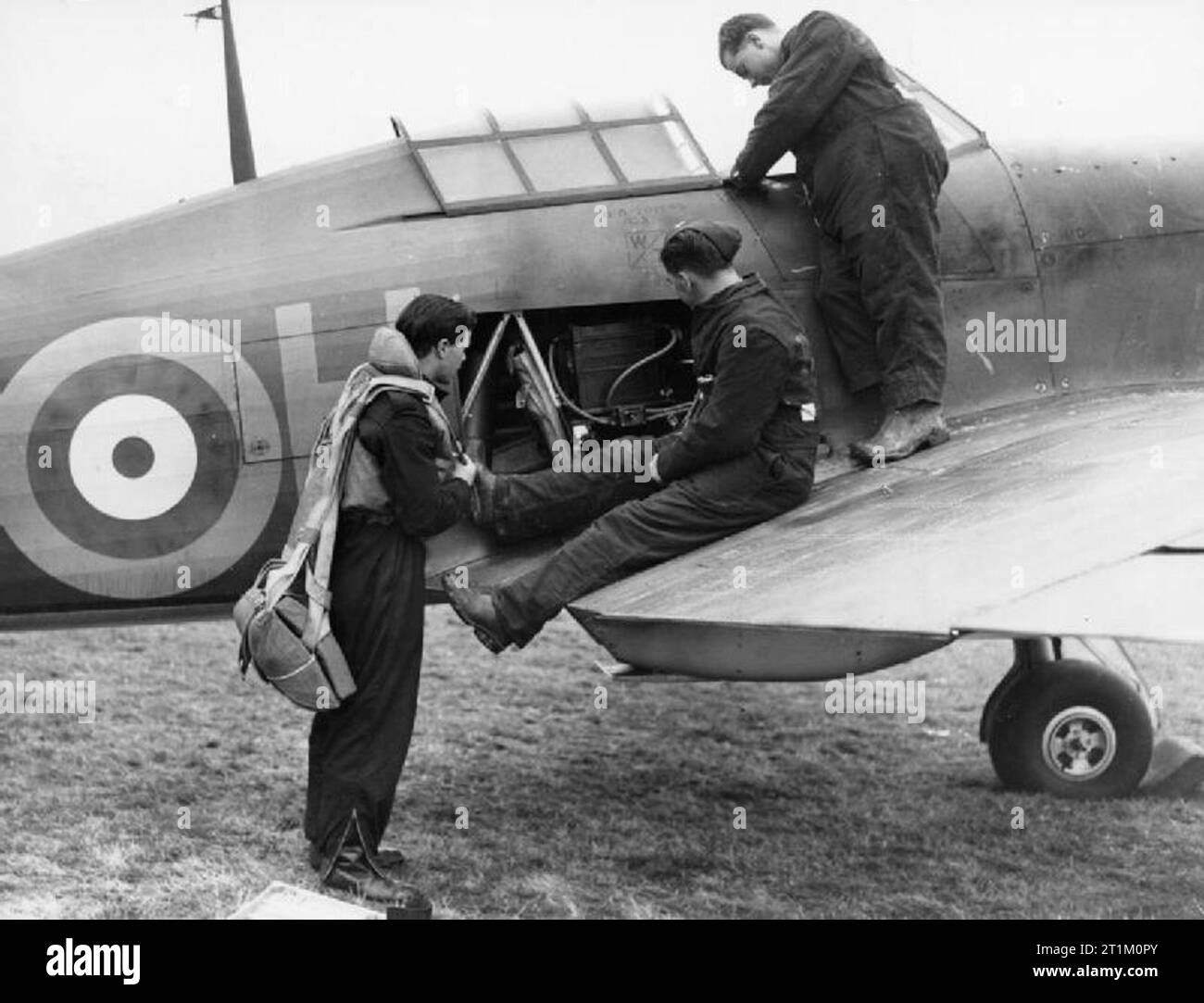 RAF Fighter Command 1940 A Hurricane pilot and ground staff inspect the ...