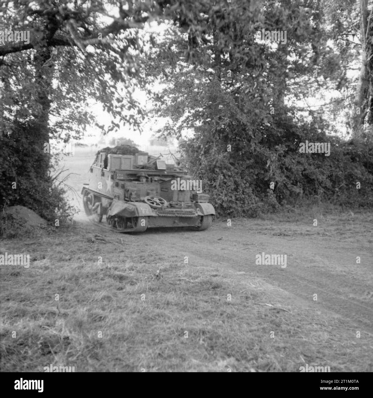 The British Army in Normandy 1944 A heavily-loaded Universal carrier ...
