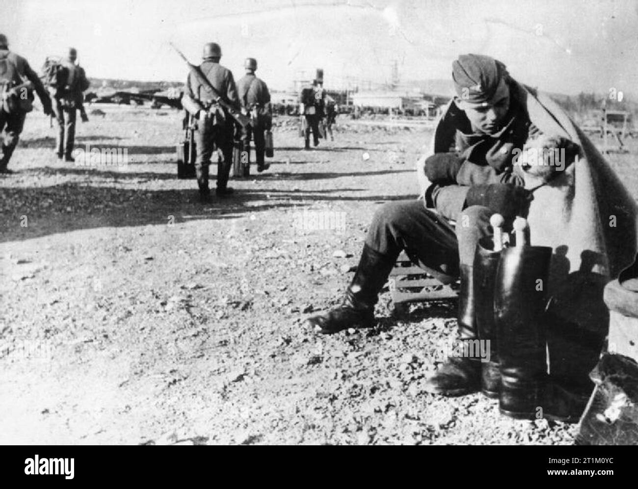 The German Invasion of Norway, 1940 A german soldier cradles his pet ...