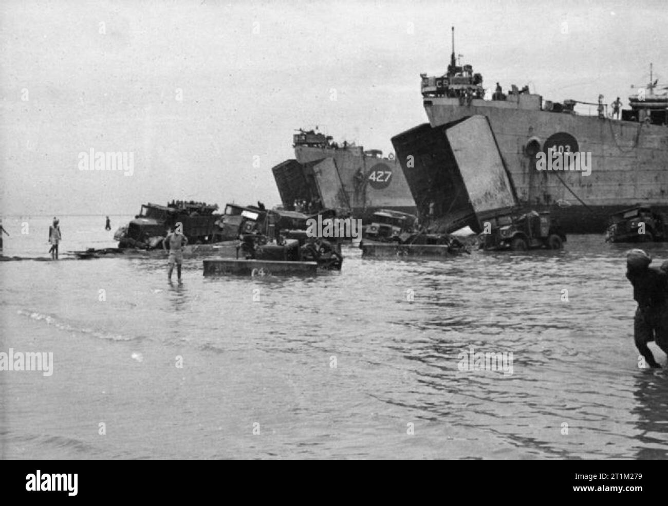 Lst (2) 403 Beached and discharging CEVs in the Far East. Bows only in ...
