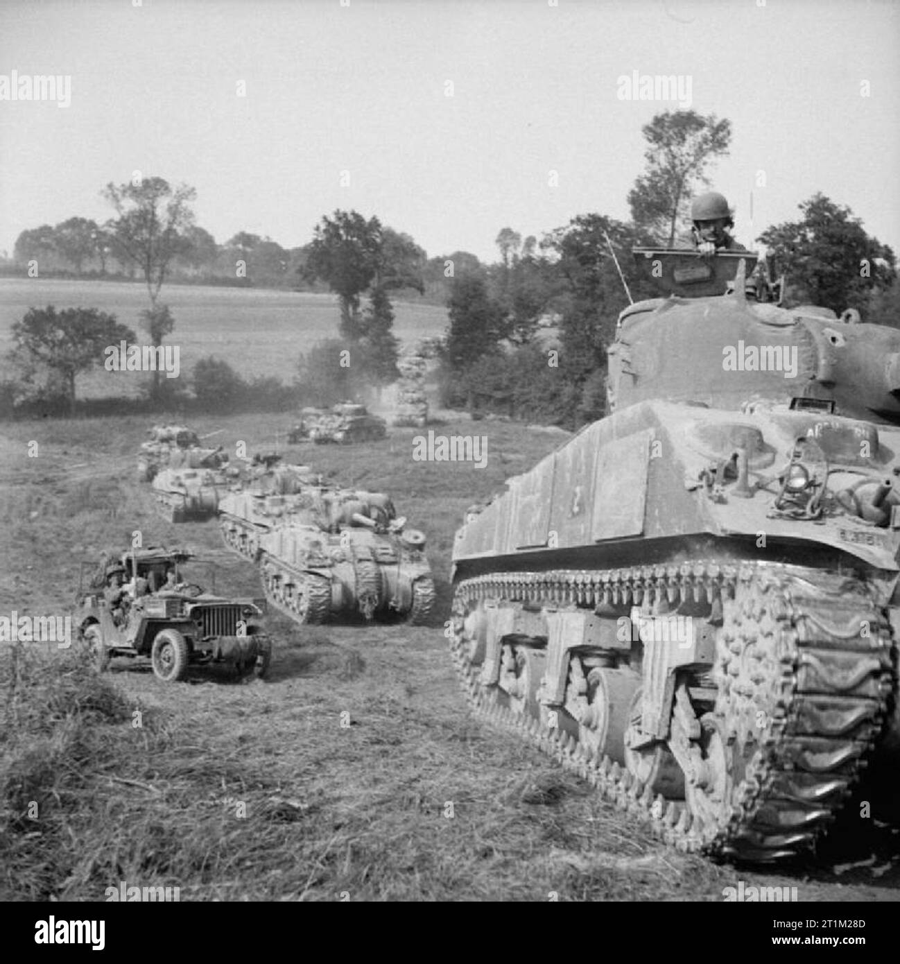 The British Army in Normandy 1944 A column of Sherman tanks of 2nd ...