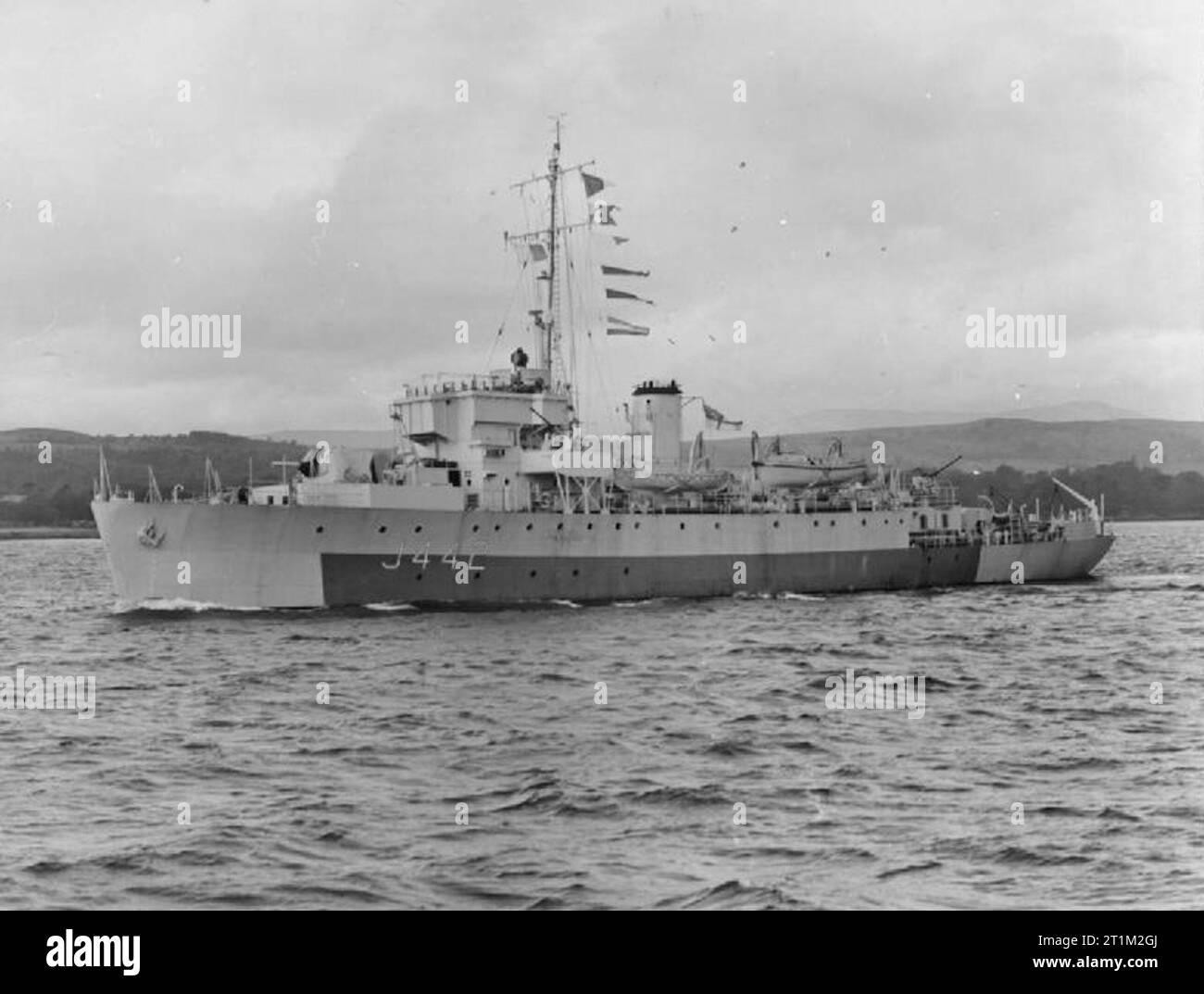British Algerine class minesweeper HMS Niger (J73) underway, coastal ...