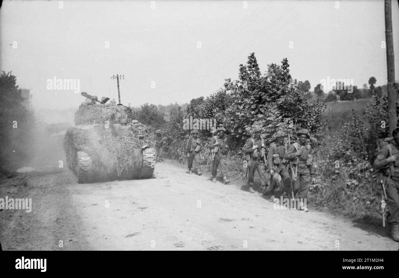 The British Army in Normandy 1944 A Sherman tank and infantry of the ...