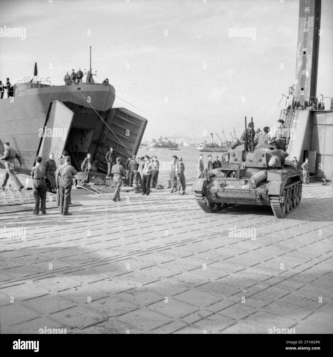 The British Army in Normandy 1944 A Crusader AA tank comes ashore from ...