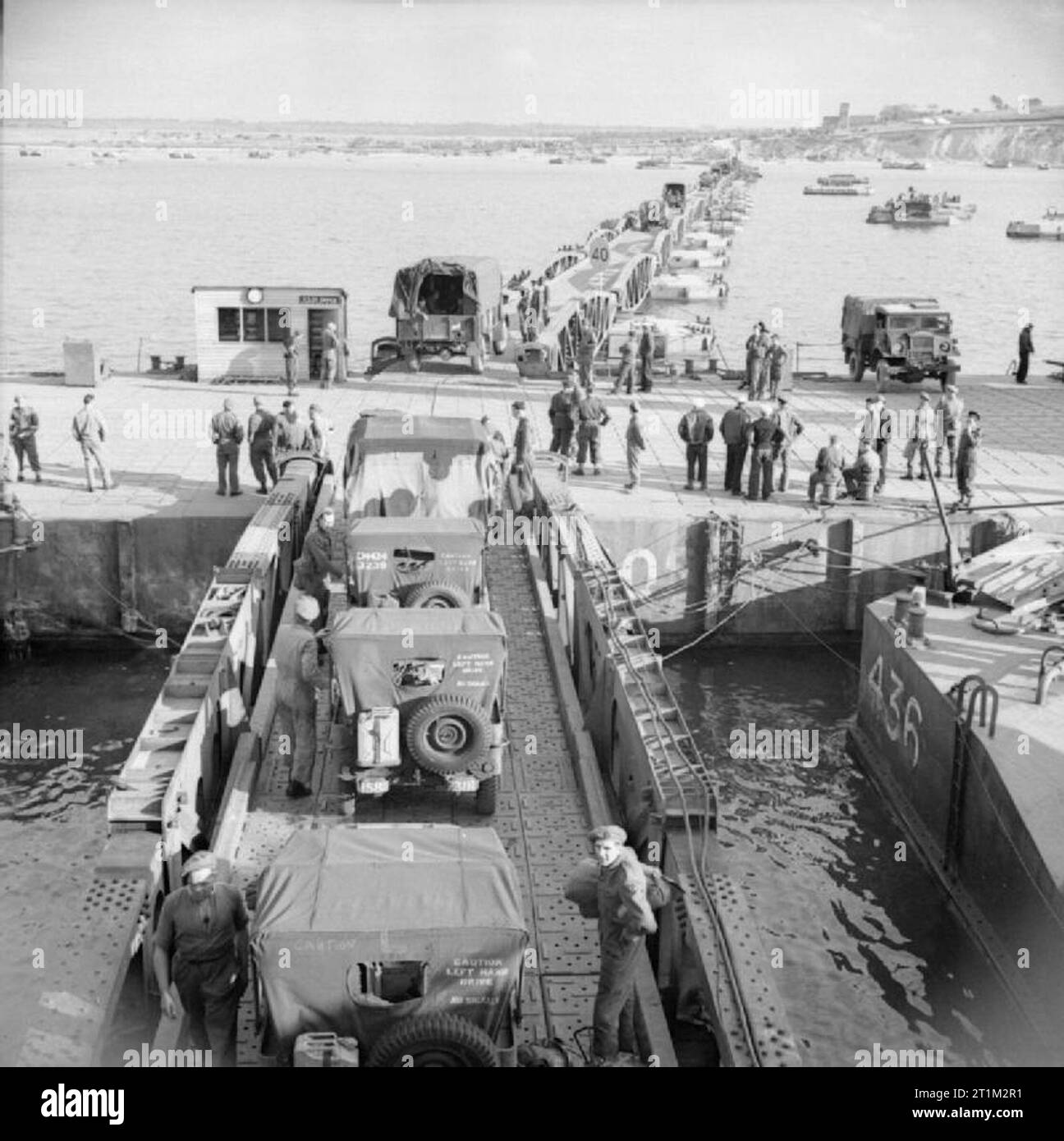 The British Army in Normandy 1944 Vehicles driving ashore from the ...