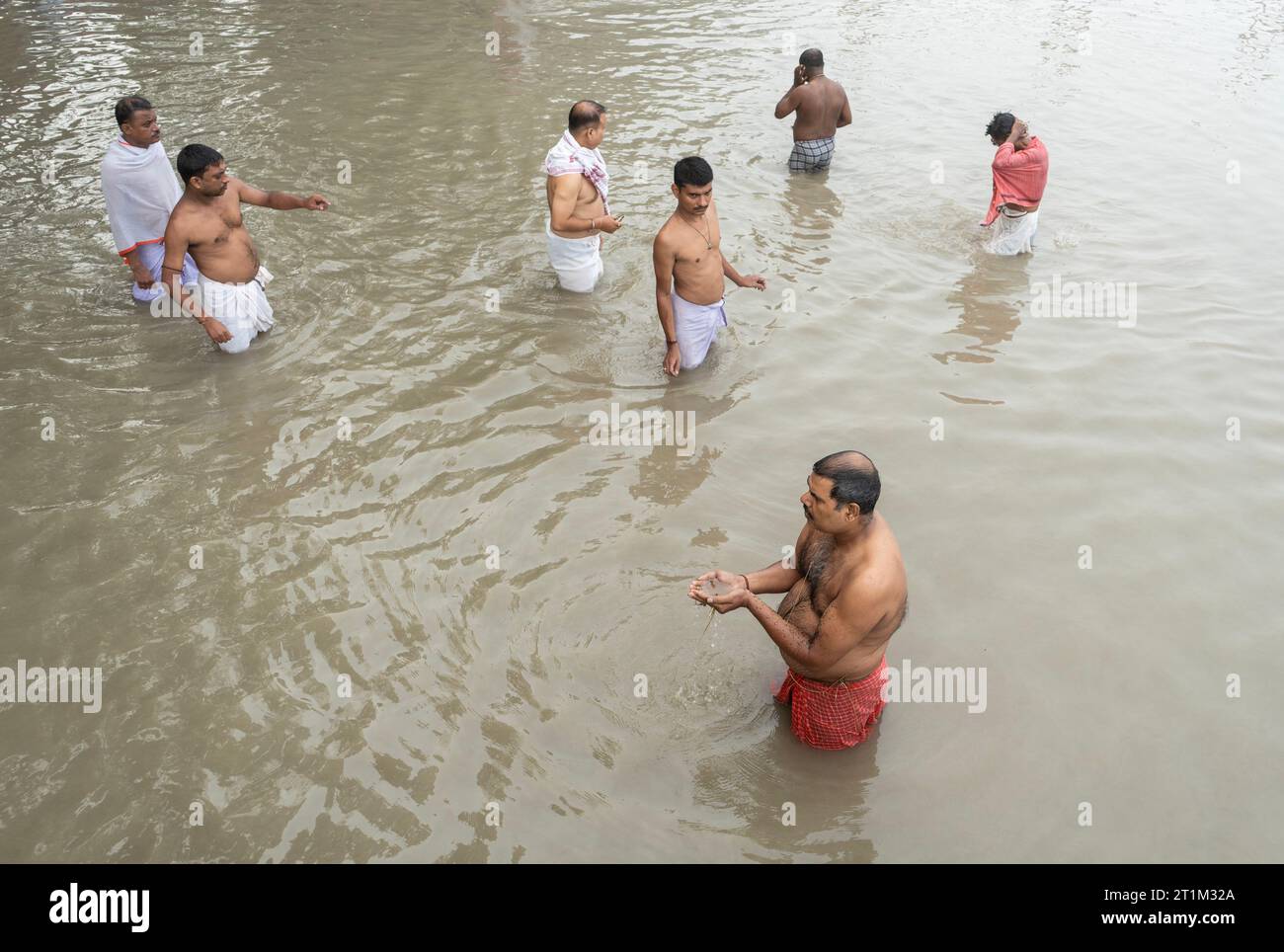 October 14, 2023: Hindu devotees perform the 'Tarpan' ritual during ...