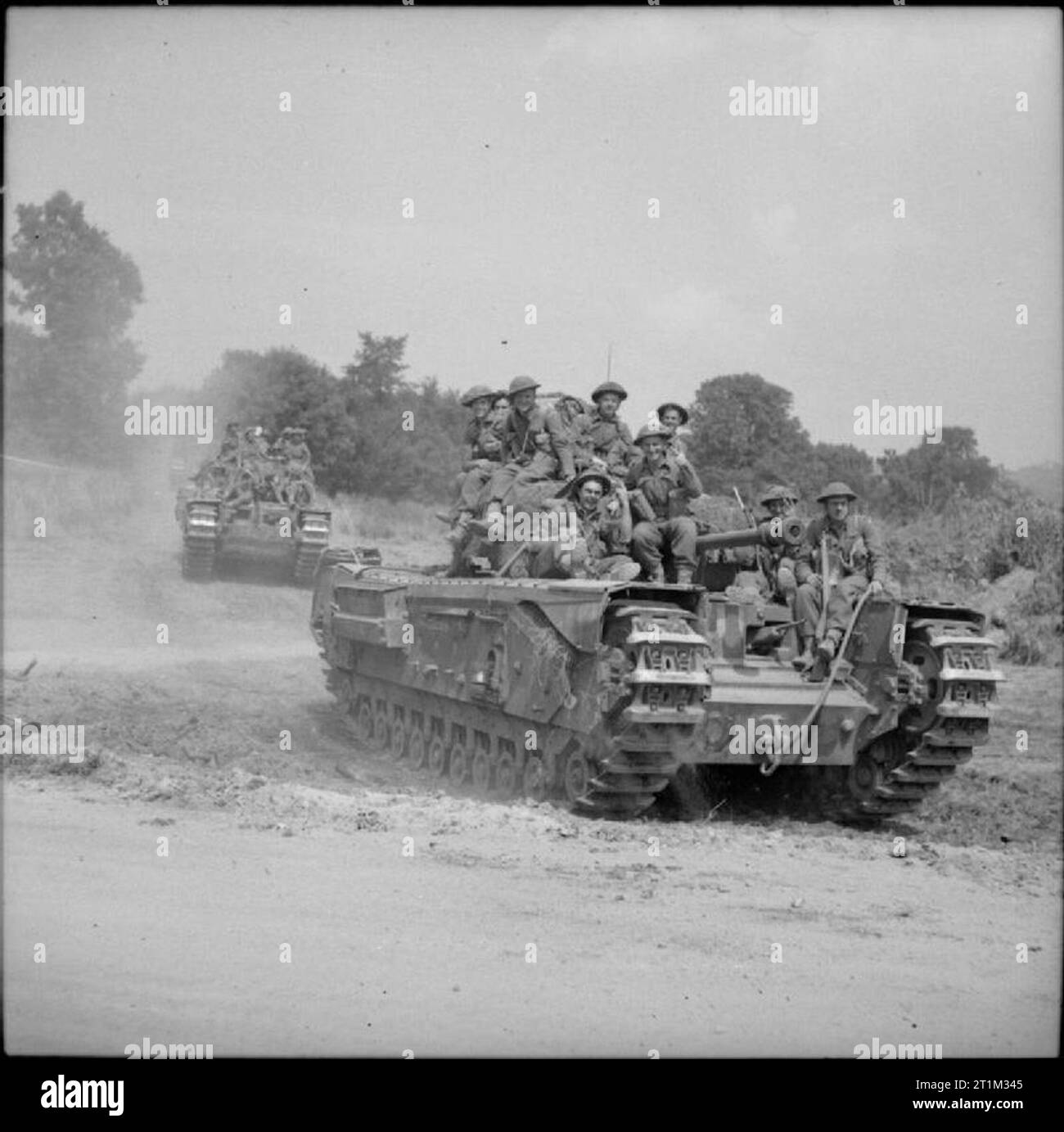 The British Army in Normandy 1944 Churchill tanks carrying infantry ...