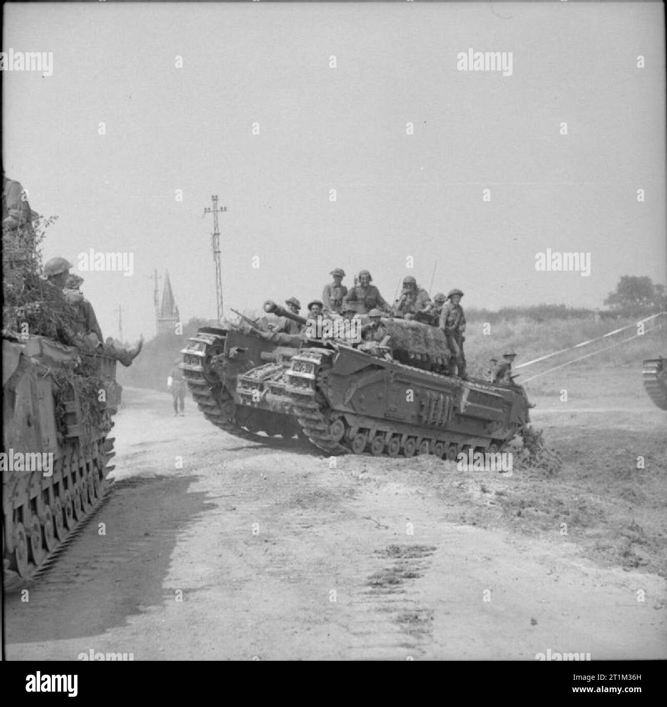 The British Army in Normandy 1944 Churchill tanks carrying infantry ...
