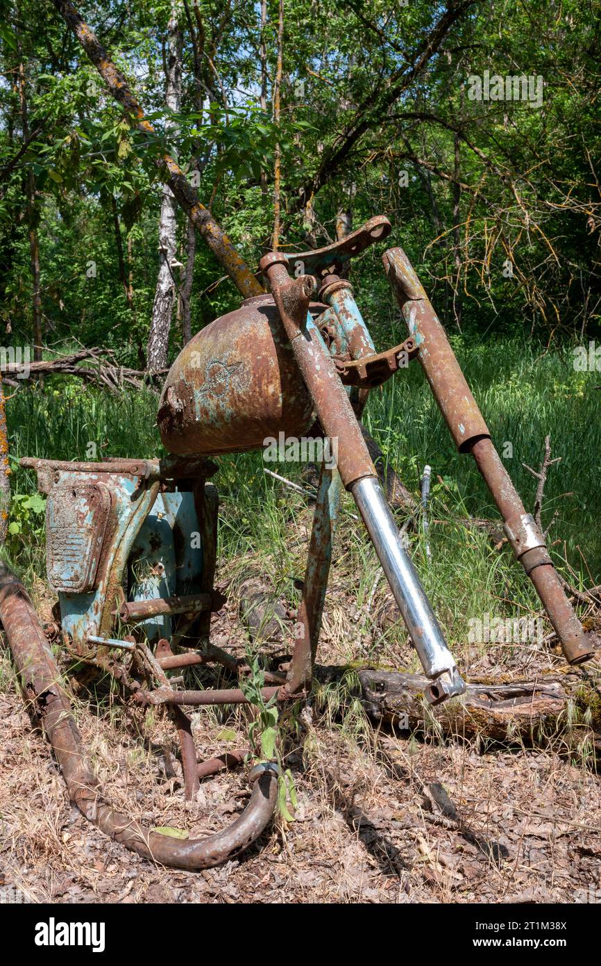 Rusty frame from a motorcycle in the exclusion zone of Belarus Stock ...