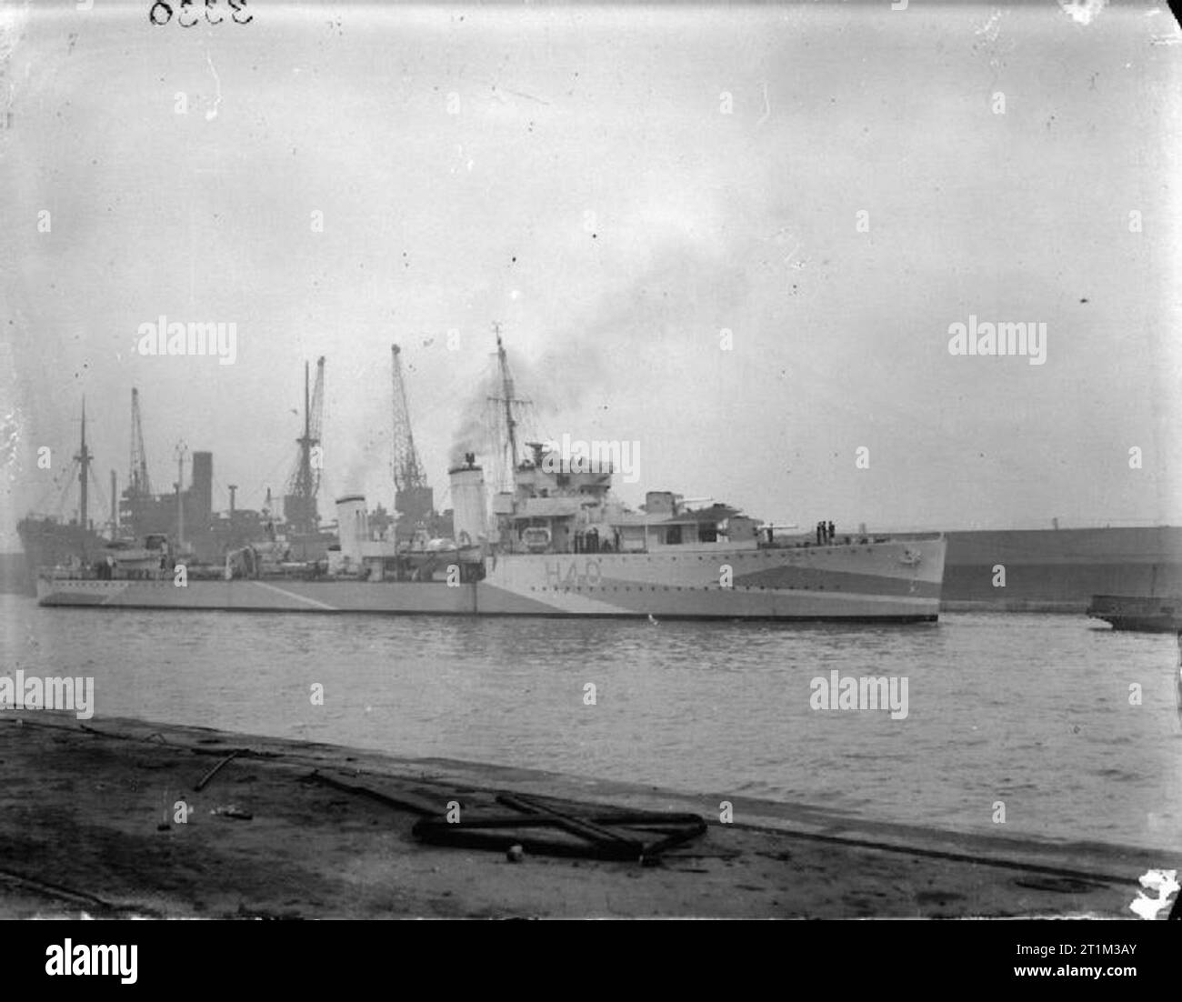 British destroyer HMS Anthony Underway, in harbour. Pennant No H40 ...