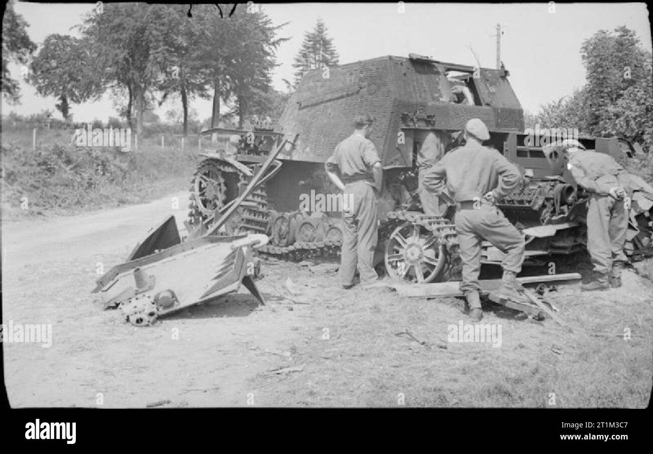 The British Army in Normandy 1944 Troops examine a destroyed German ...