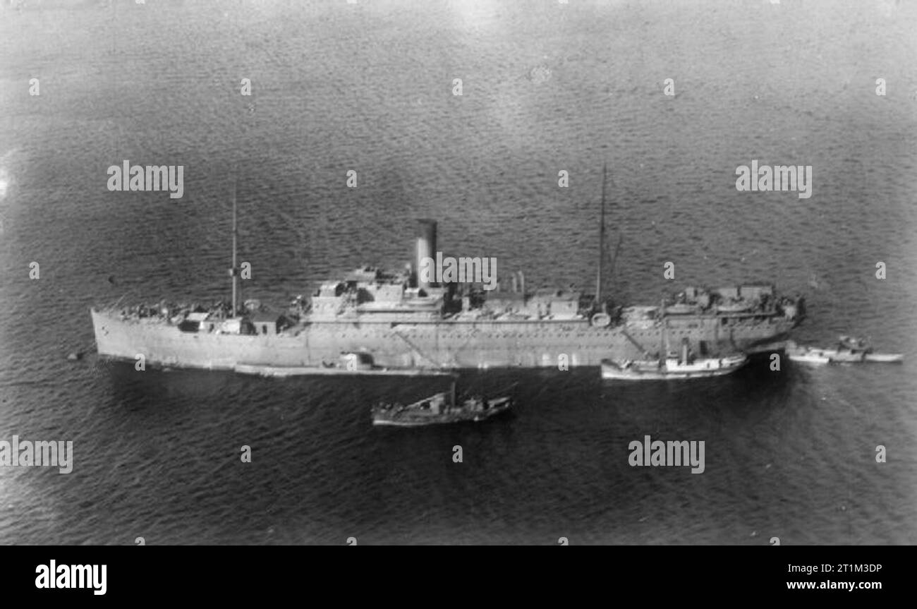HMS Dunluce Castle At a buoy, with ships alongside Stock Photo - Alamy
