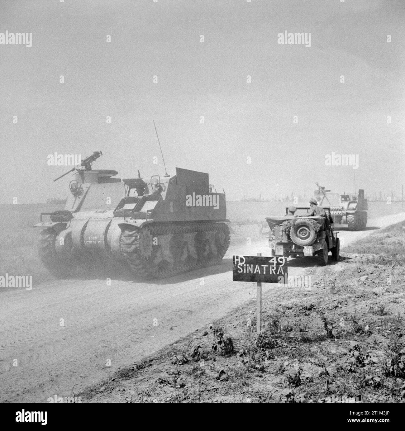 The British Army in Normandy 1944 Priest infantry carriers move up to ...