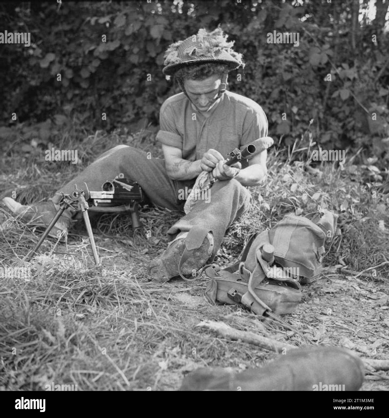 The British Army in Normandy 1944 A soldier cleaning his Bren gun, June ...