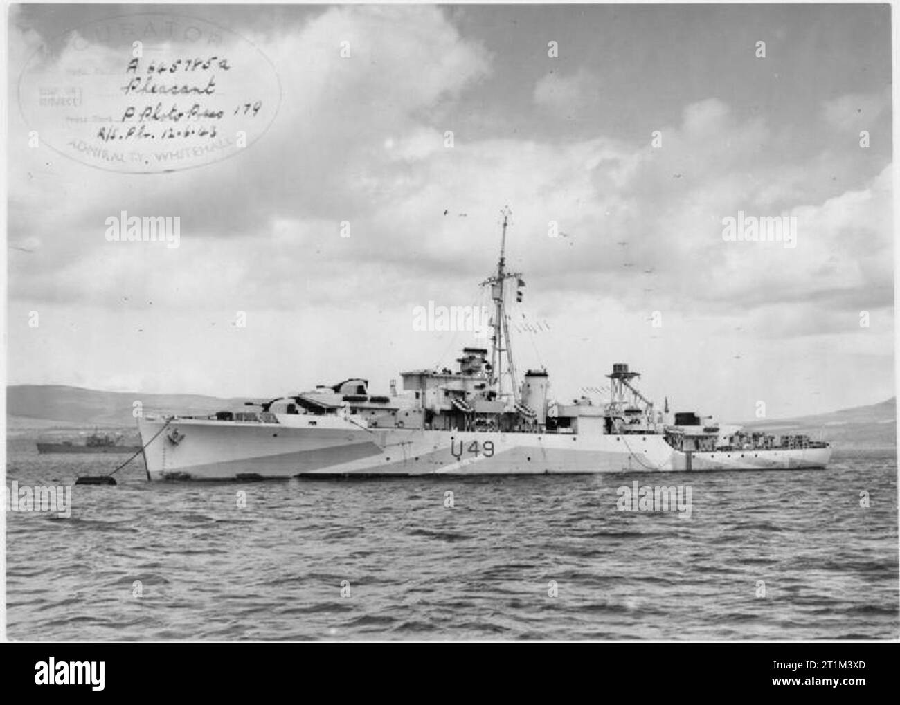 British Black Swan class sloop HMS Pheasant (U49) moored at a buoy ...
