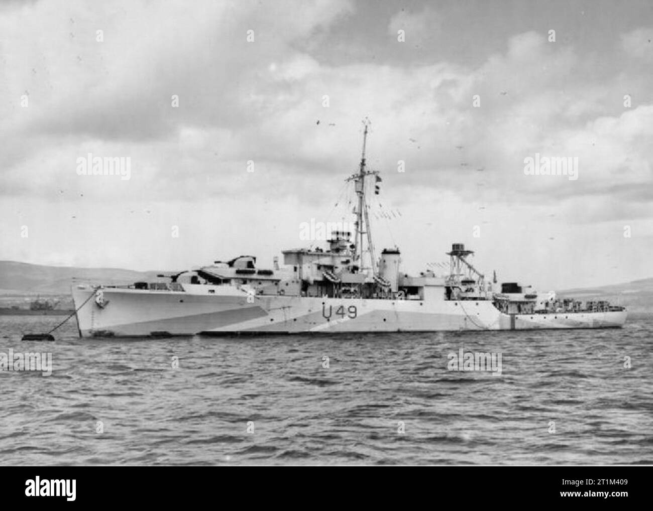 British Black Swan class sloop HMS Pheasant (U49) moored at a buoy ...