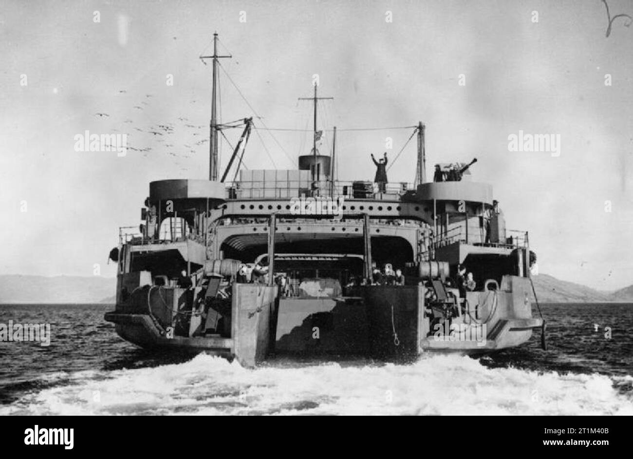 HMS Princess Iris Underway at sea. The photograph shows an LCM being ...