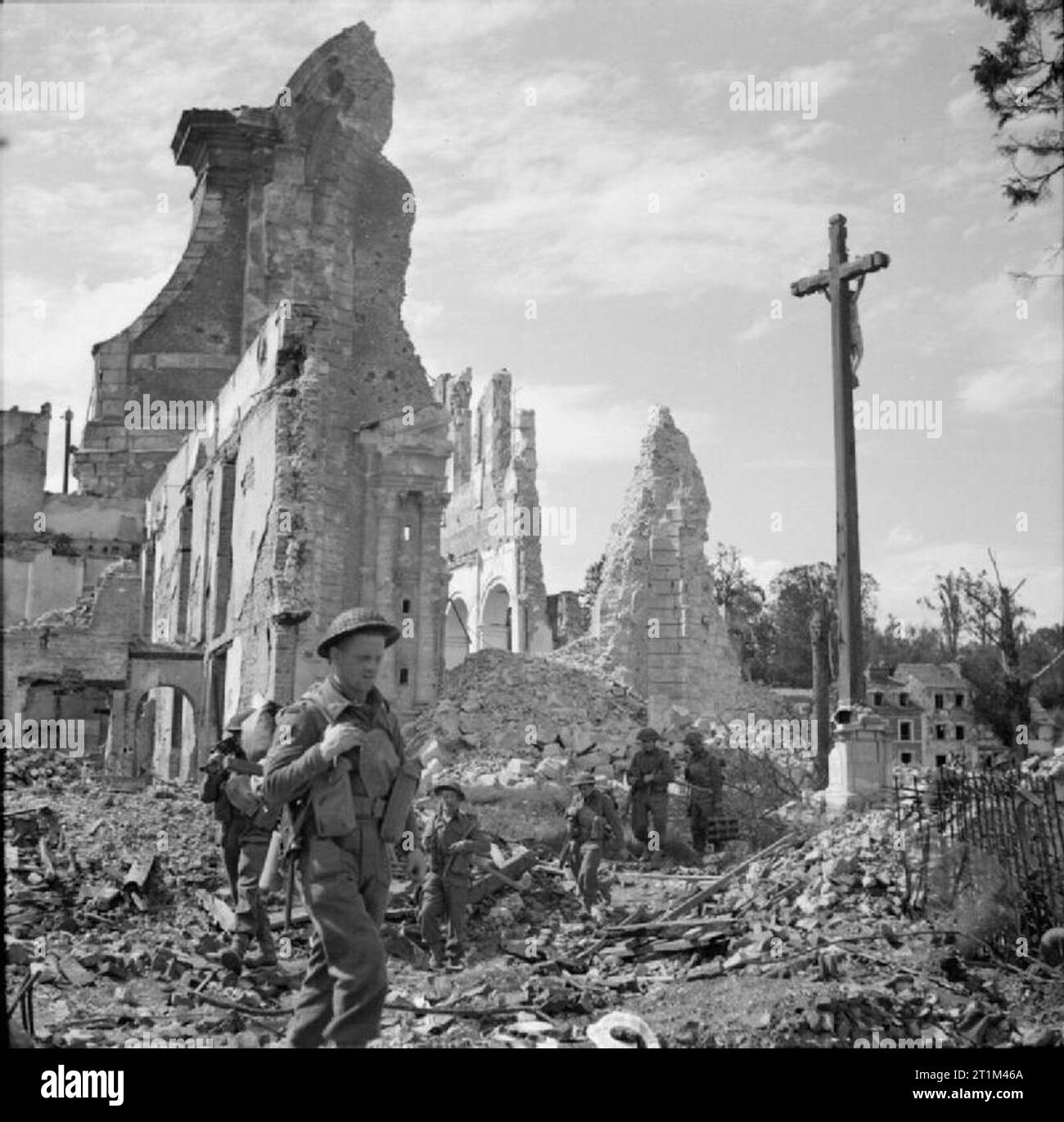 The British Army in Normandy 1944 Troops wending their way through the ...