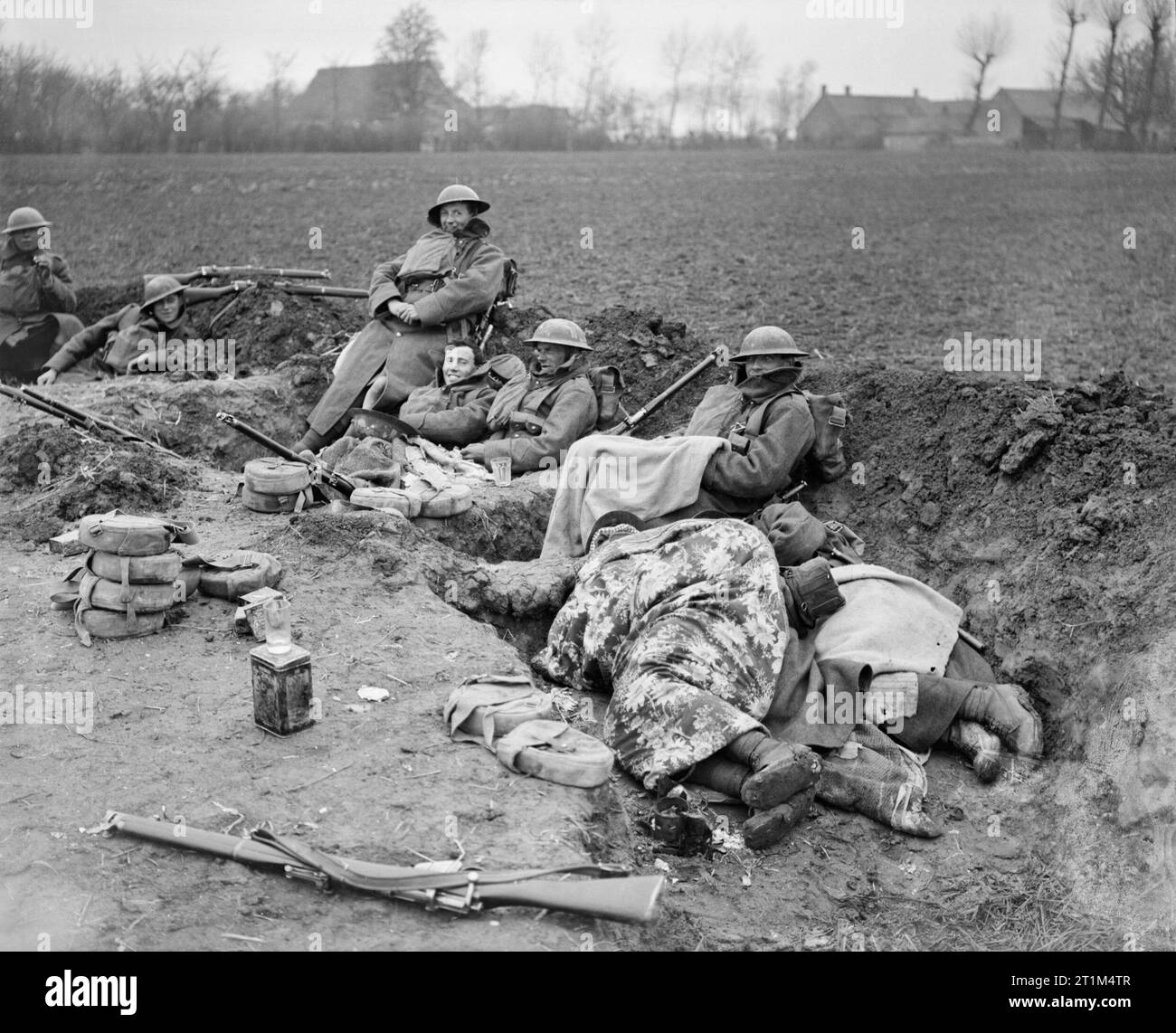 Men of the 51st Division resting in a hastily dug trench during the ...