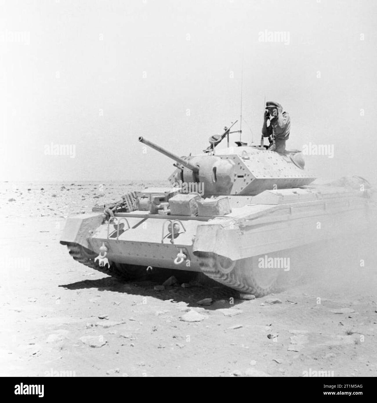A Crusader tank of the 22nd Armoured Brigade returning after action in ...