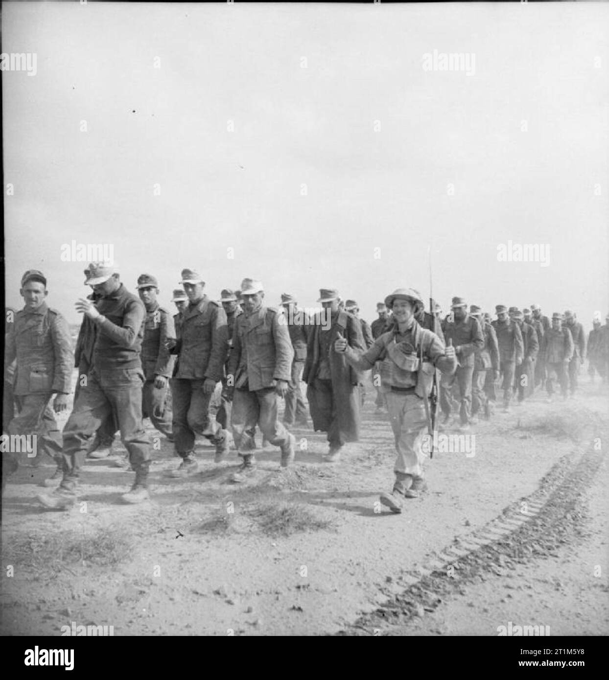 The British Army in North Africa 1941 A soldier escorting the first ...