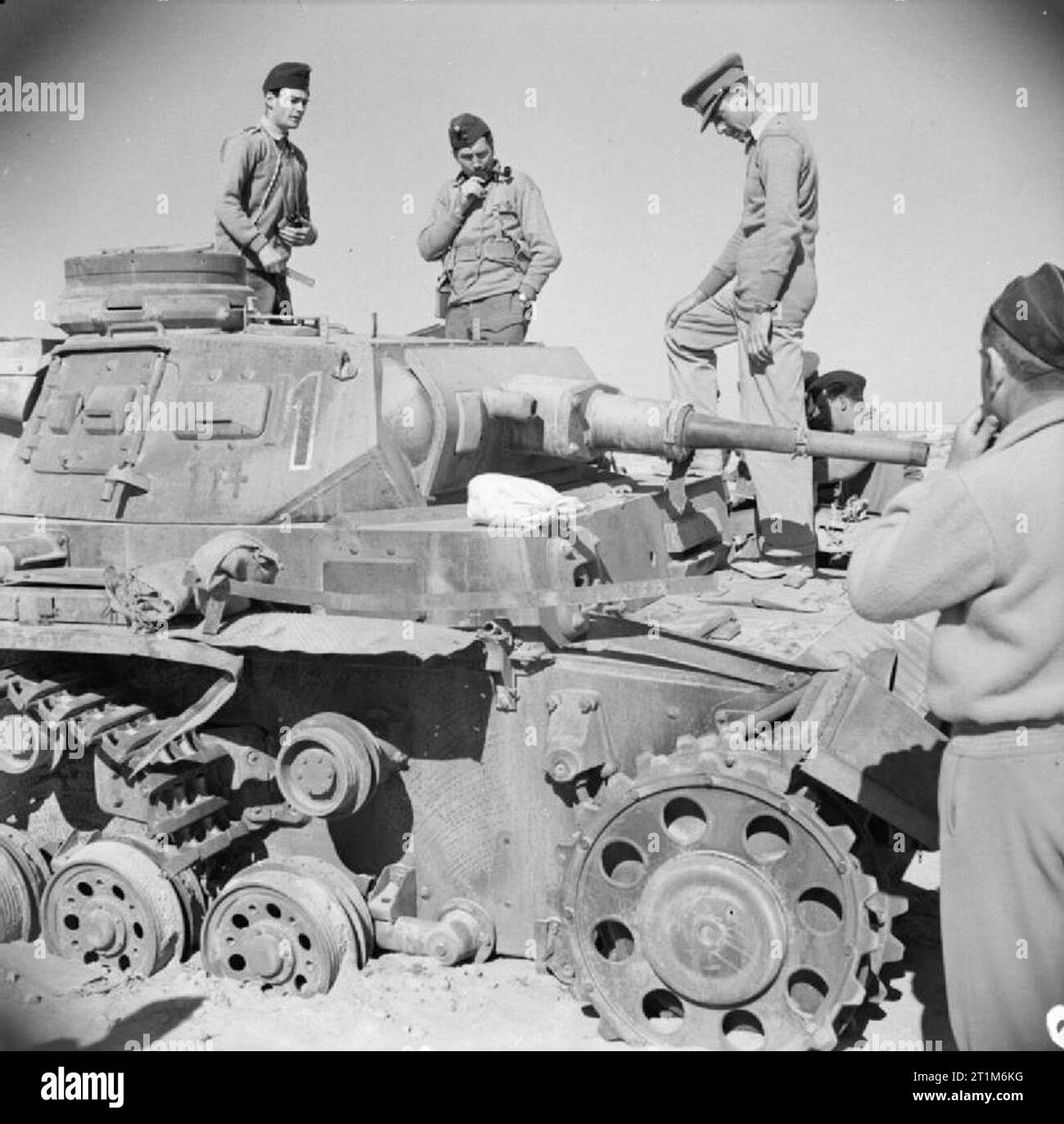 The British Army in North Africa 1942 Officers examine a knocked-out ...
