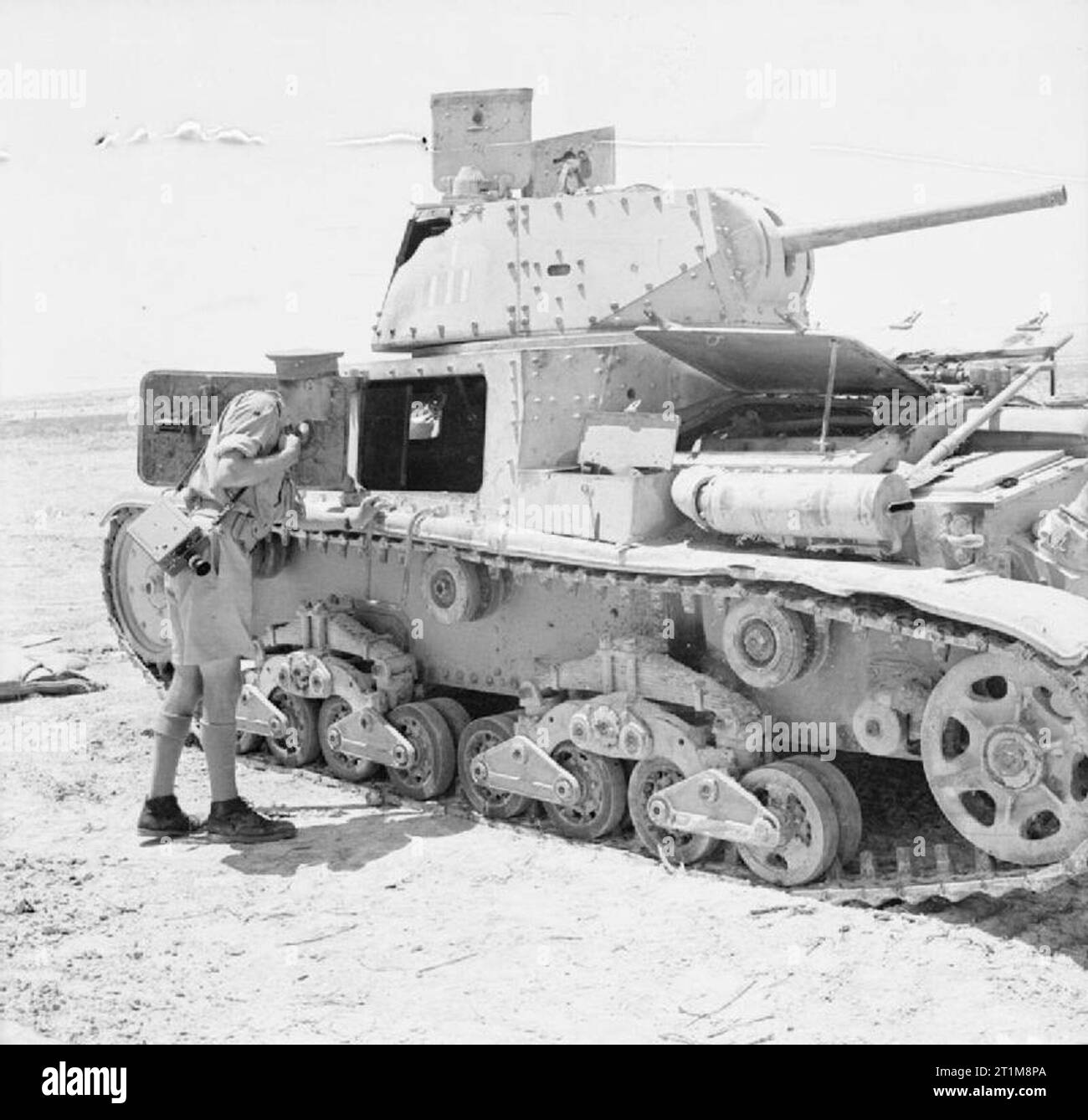 The British Army in North Africa 1942 An AFPU cameraman inspects a ...