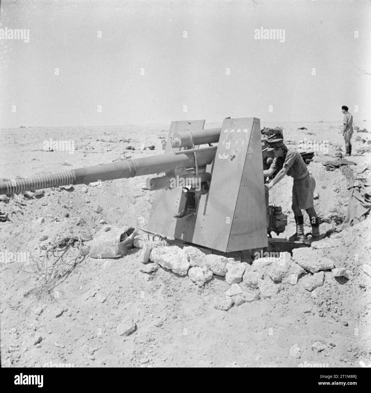 The British Army in North Africa 1942 A soldier inspects a dug-in ...