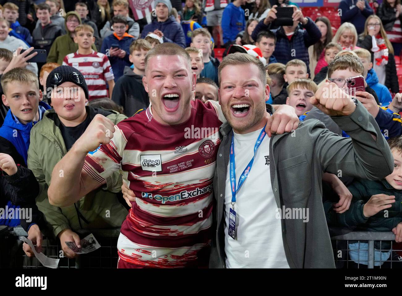 Morgan Smithies #13 of Wigan Warriors celebrates with his brother after ...