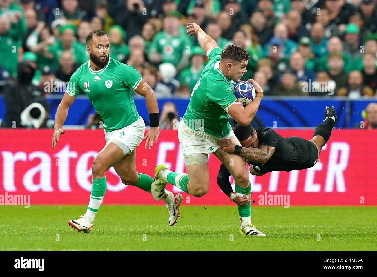 New Zealand's Aaron Smith (right) attempts to tackle Ireland's Garry ...