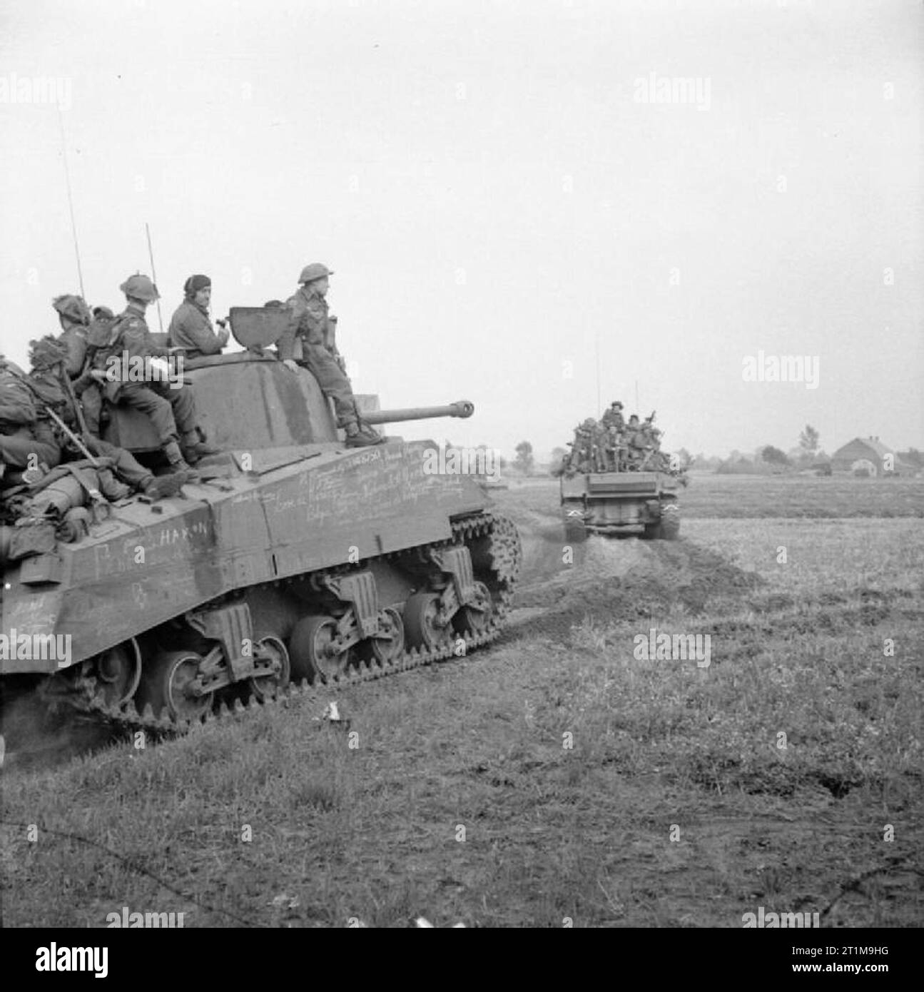 The British Army in North-west Europe 1944-45 Sherman tanks carrying ...