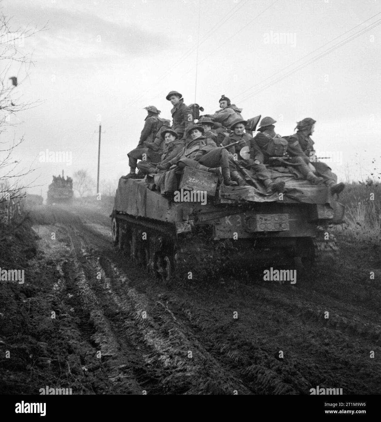 The British Army in North-west Europe 1944-45 A Sherman tank carrying ...