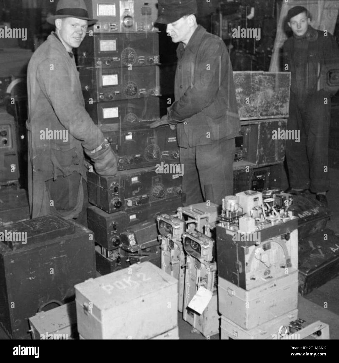 Germany Under Allied Occupation German workers stack former Wehrmacht ...