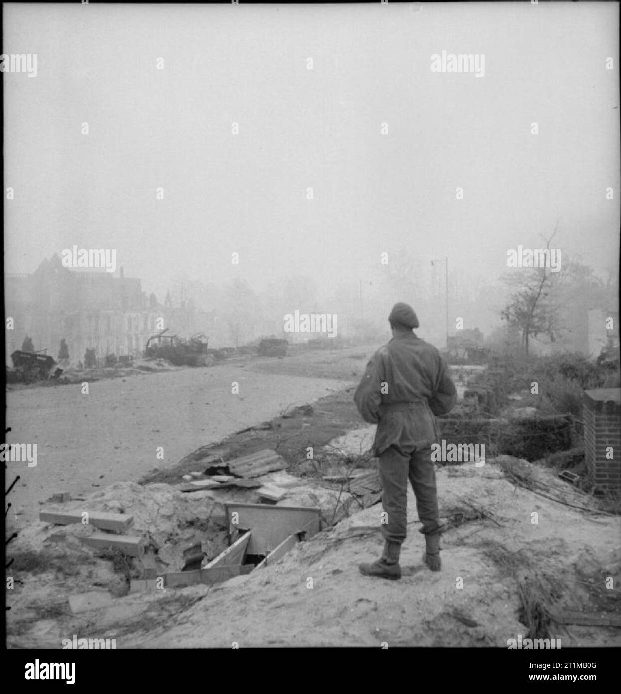 The British Army in North-west Europe 1944-45 A soldier looks down the ...
