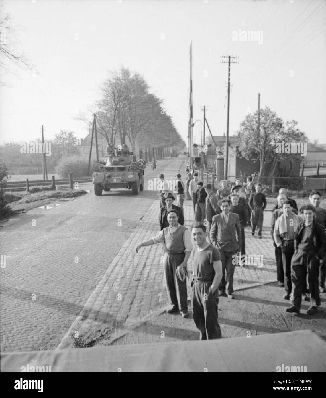 The British Army in North-west Europe 1944-45 German civilians watch a ...