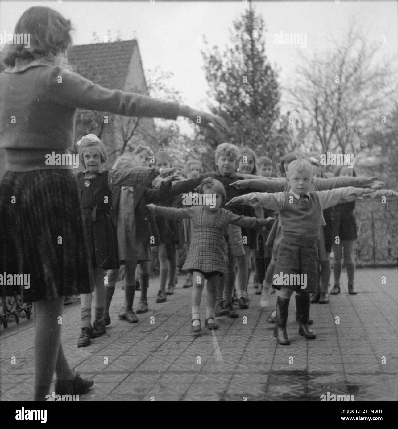 Germany Under Allied Occupation Miss Von der Heyde leads the children ...