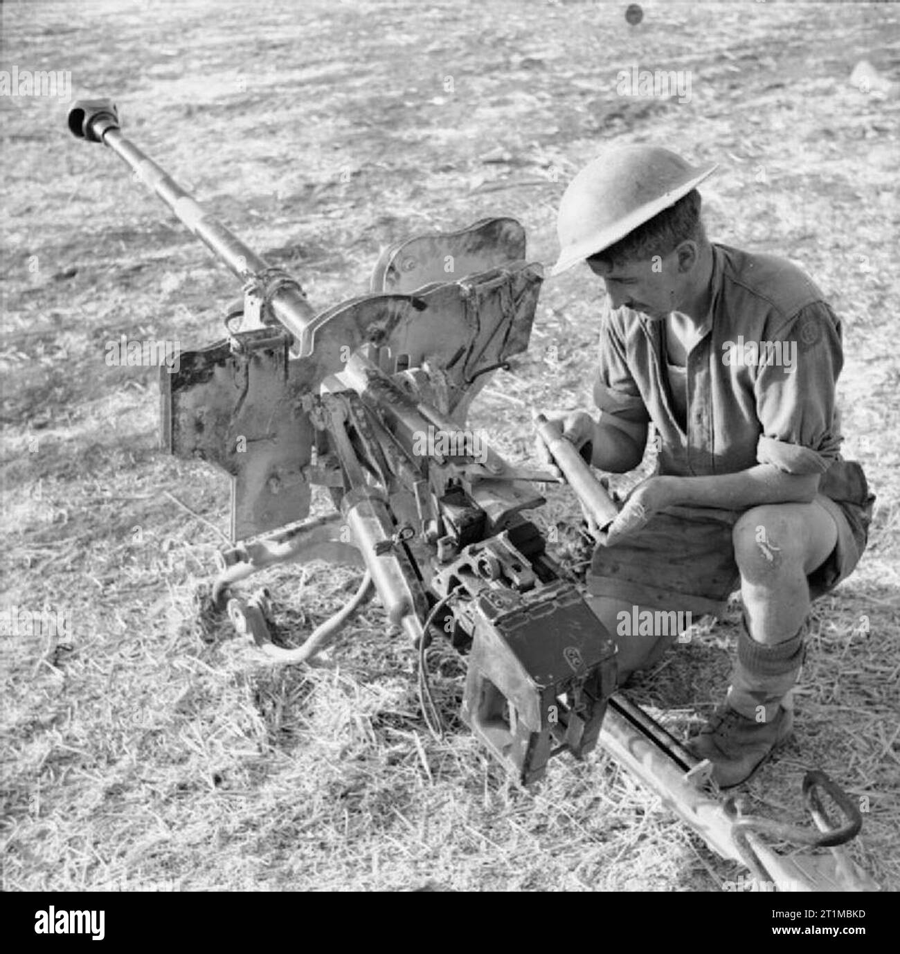The British Army in Sicily 1943 A soldier examines a captured German ...