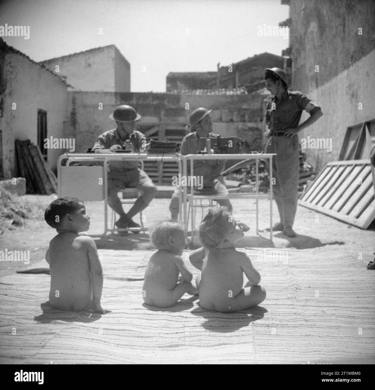 The British Army in Sicily 1943 Three Italian babies wait to be ...